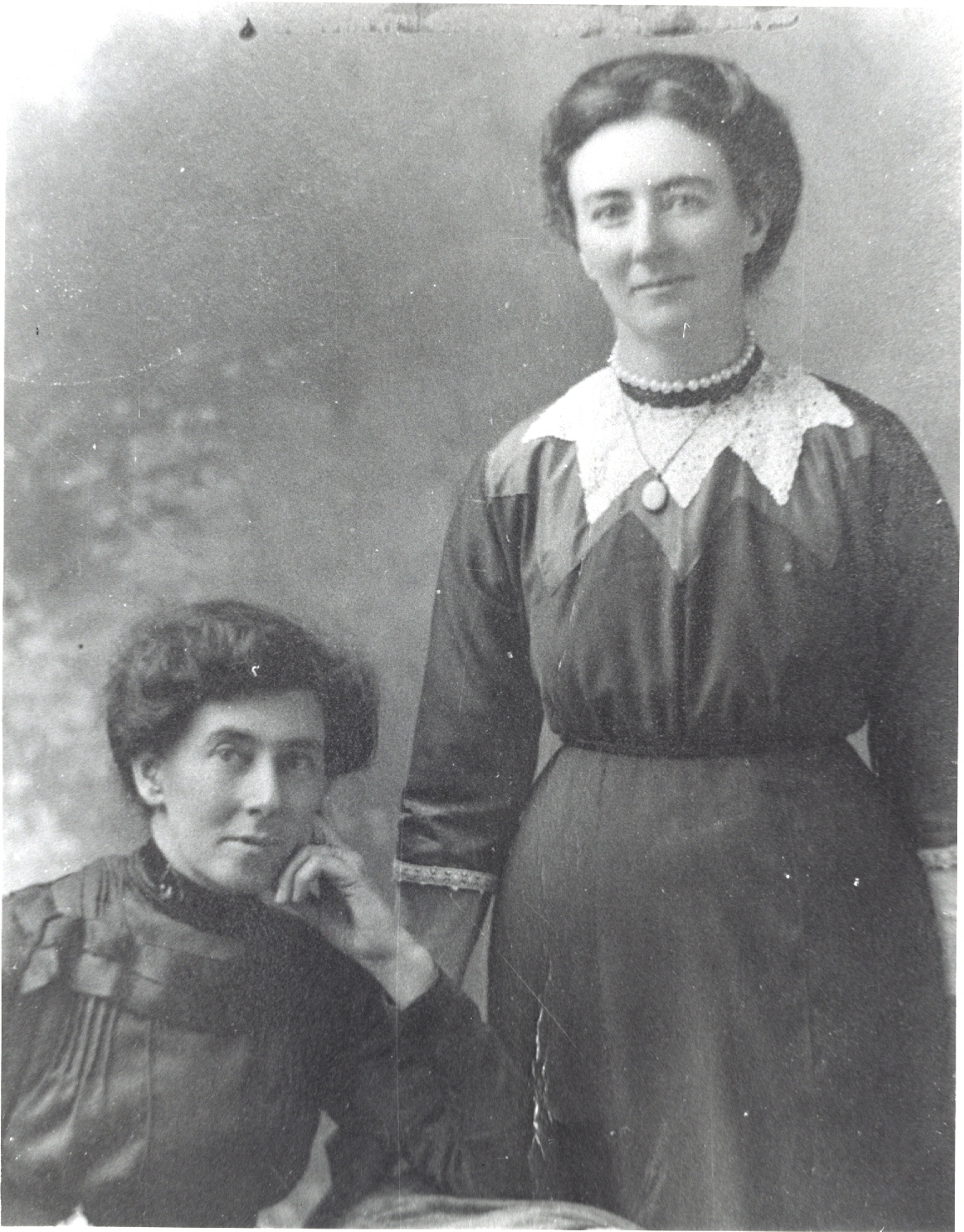 Clara Cox (standing) and Annie Cox - High Country History Hub