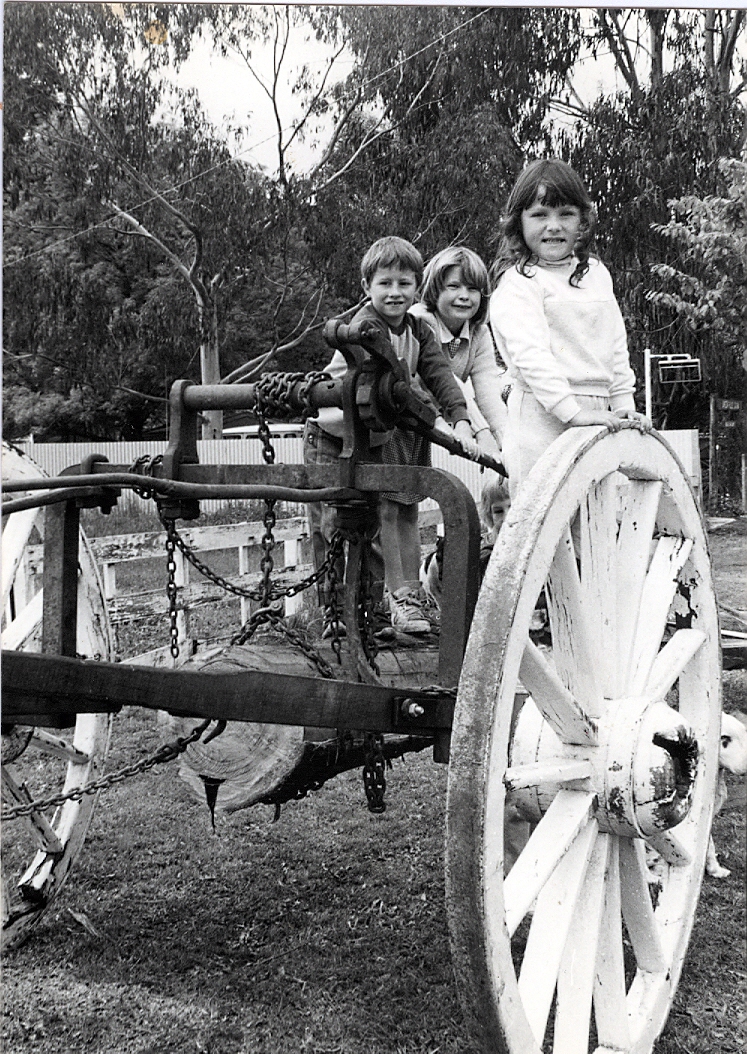 Children on a horse drawn timber jinker - High Country History Hub