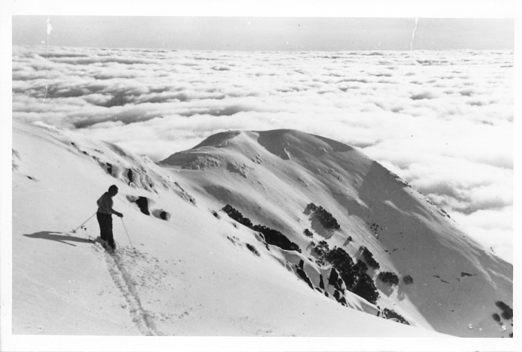 Skiing on Mt Buller. Slopes above clouds - High Country History Hub
