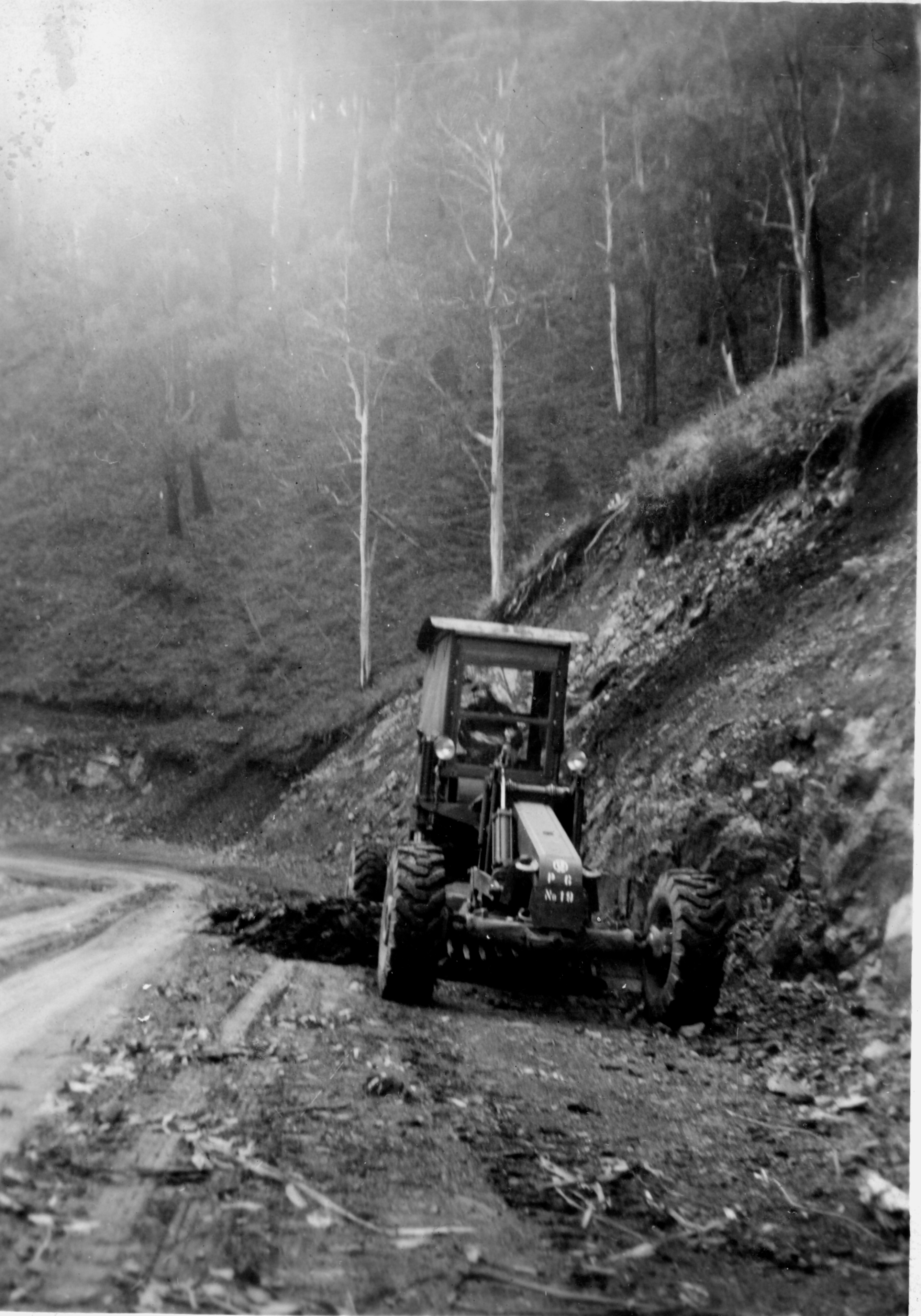 Forestry Commission. Four wheel drive. Grader working on the Mt ...