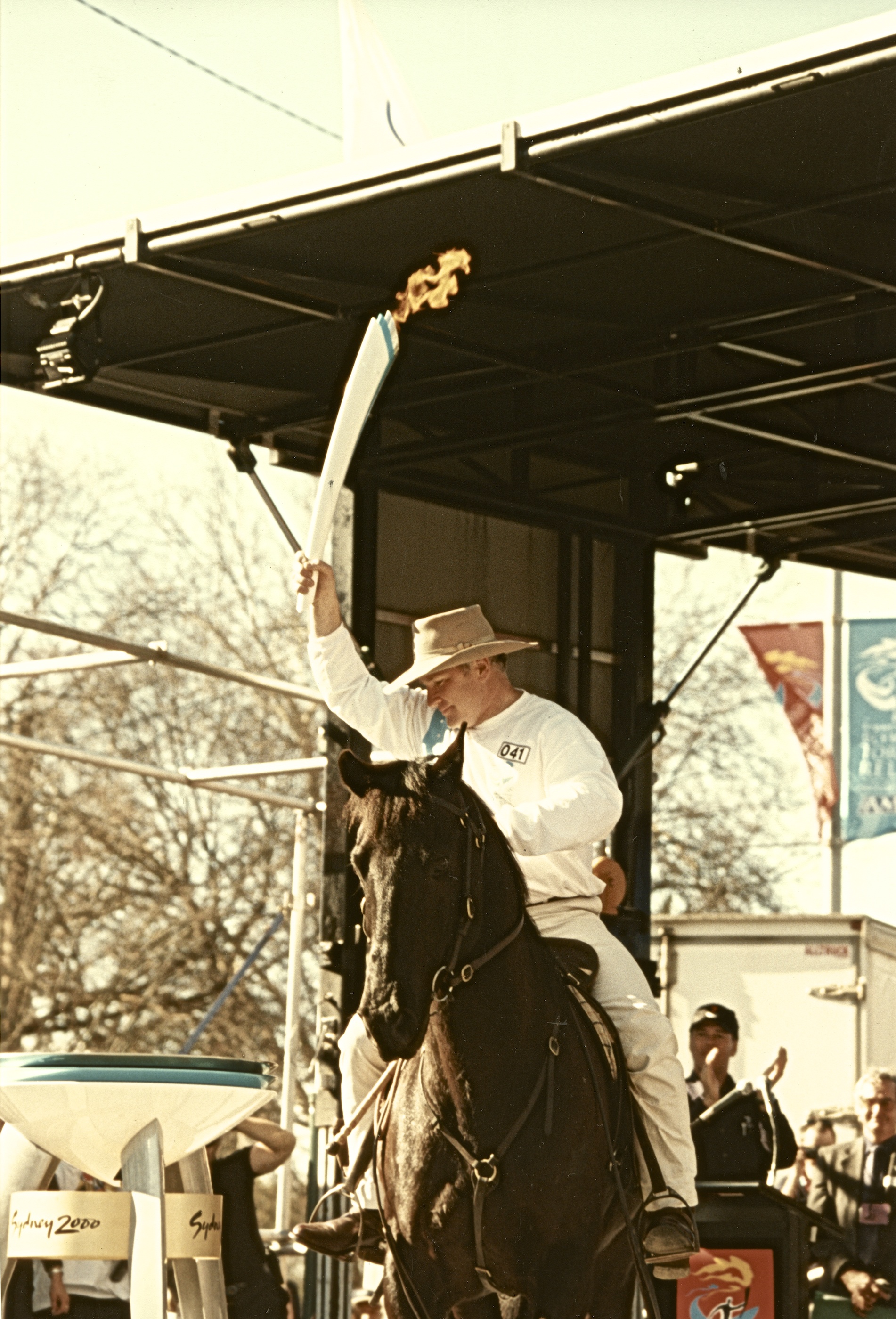 Gerald Egan and equine partner, Smoke, about to light the cauldron at ...
